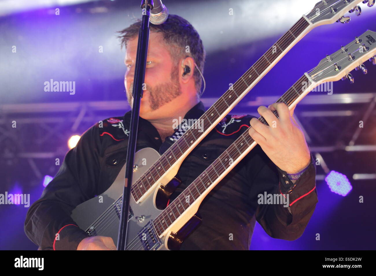 Band playing live at a concert Stock Photo - Alamy