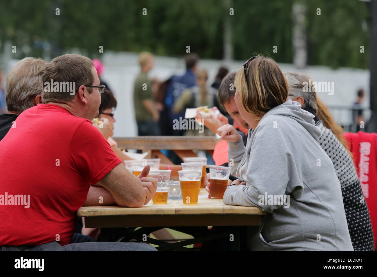 People drinking beer at a festival Stock Photo - Alamy
