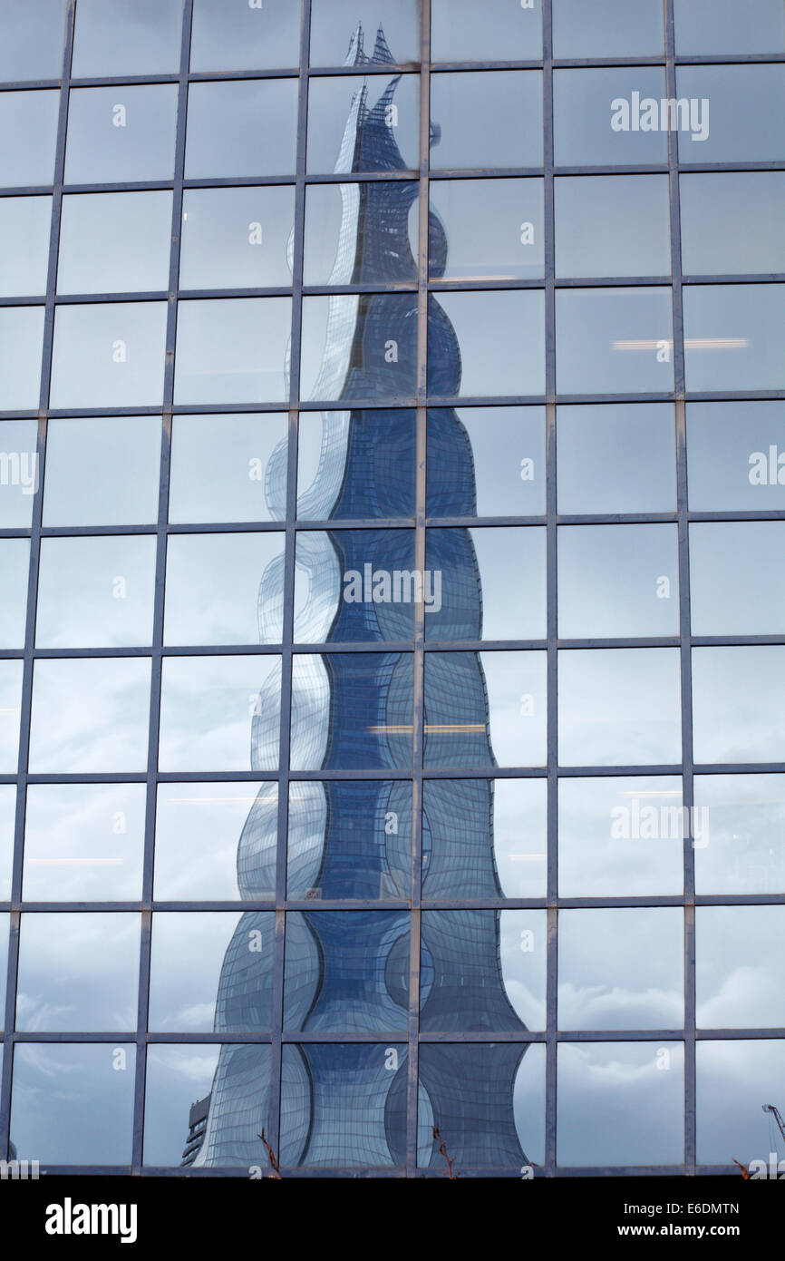 The Shard skyscraper reflected in windows of modern glass building at ...