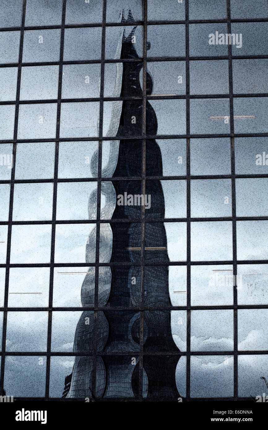 The Shard skyscraper reflected in windows of modern glass building at ...