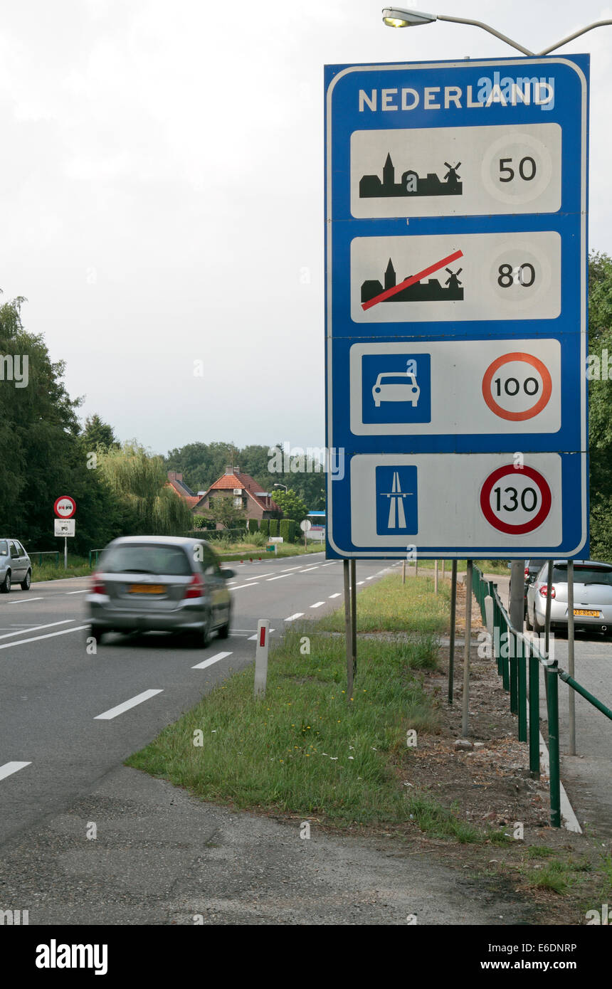 A road speed limit sign on the border between the Netherlands ...