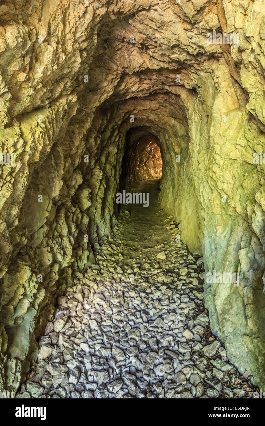 old tunnel through mountain rock Stock Photo - Alamy