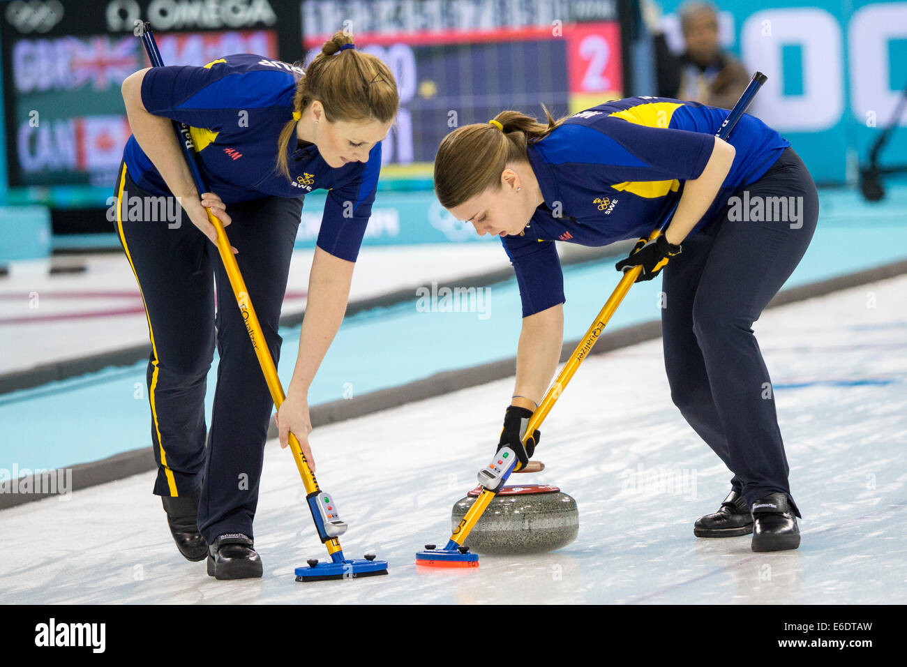 Maria Wennerstroem (R) and Christina Bertrup of Team Sweden sweeping ...