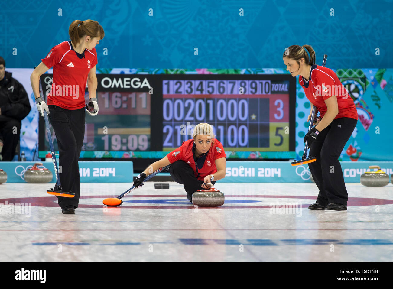 Anna Sloan (C) plays a stone with Claire Hamilton (L) and Vicki Adams ...