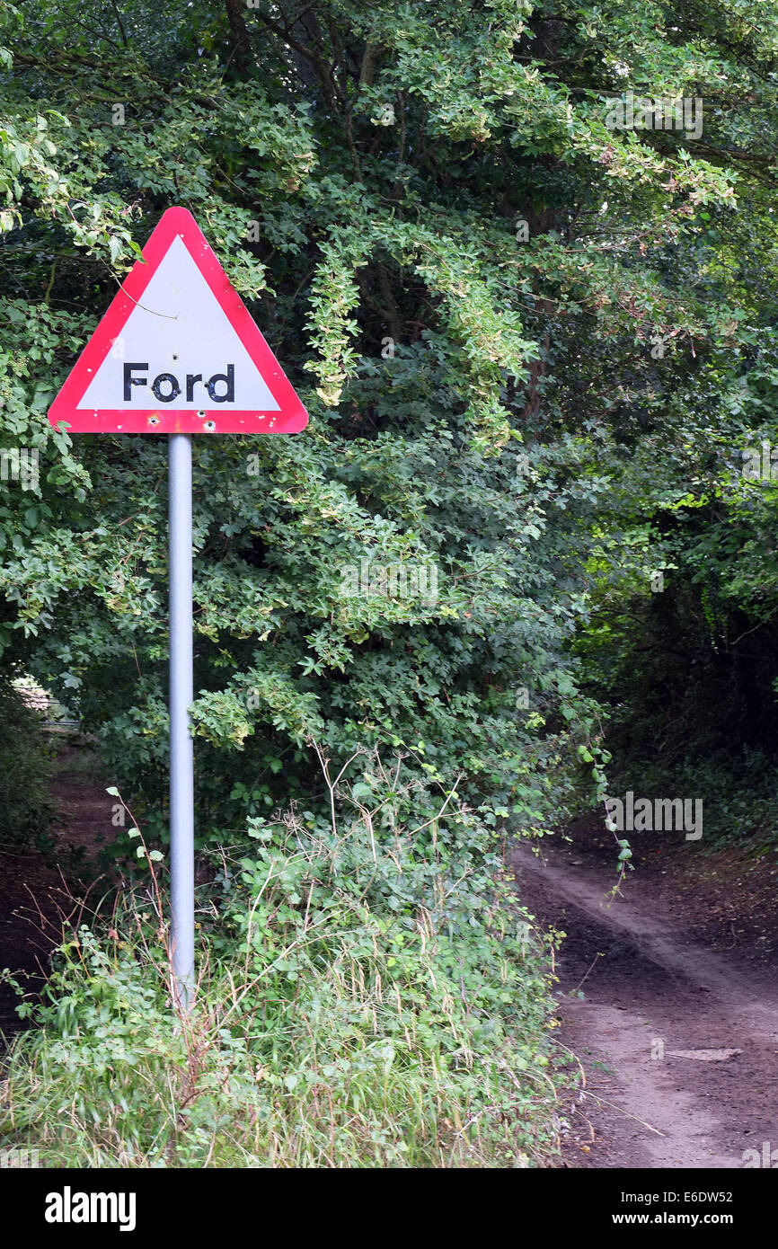 Road signs warning of a ford in the village of Wookey, Somerset ...