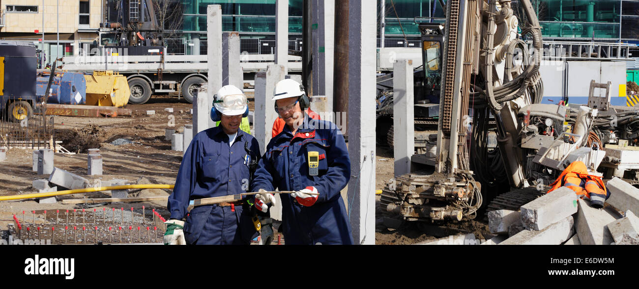 construction engineers and ground drilling machinery Stock Photo - Alamy