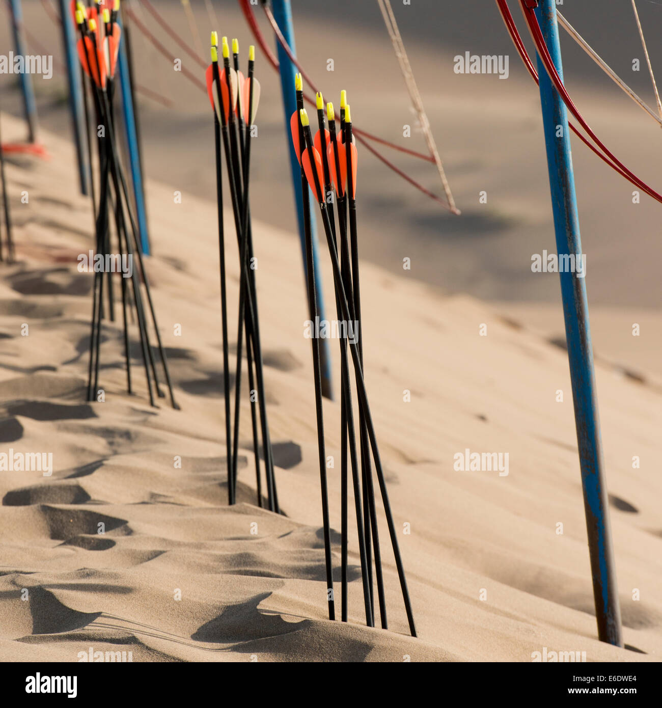 Bow and arrows on sand dunes at Mingsha Shan, Dunhuang, Jiuquan, Gansu ...