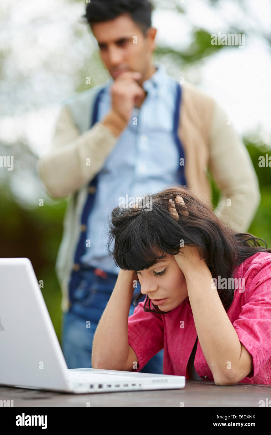 Couple looking worried Stock Photo - Alamy