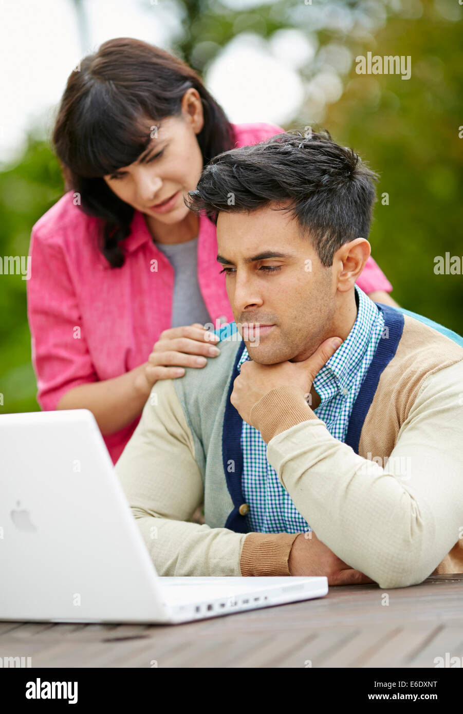 Couple looking worried Stock Photo - Alamy