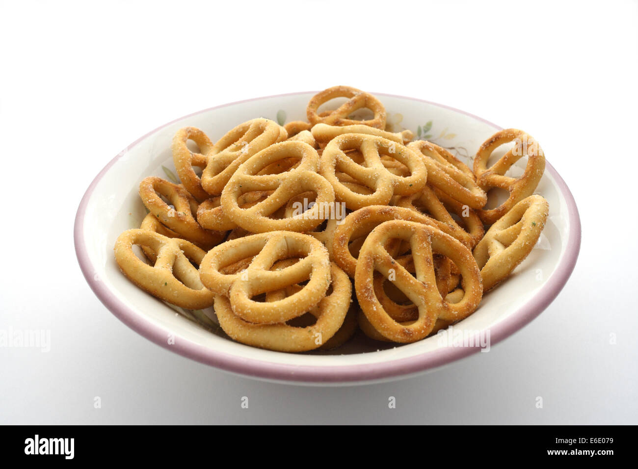 A bowl of Pretzel Knots snack food Stock Photo - Alamy