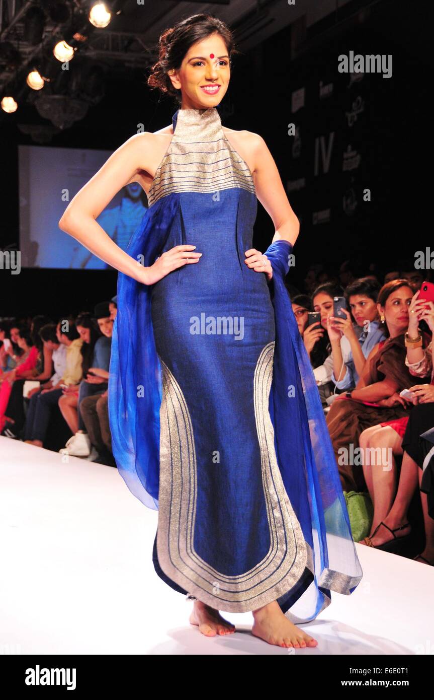 Mumbai, India. 21st Aug, 2014. A model displays the creation of female ...