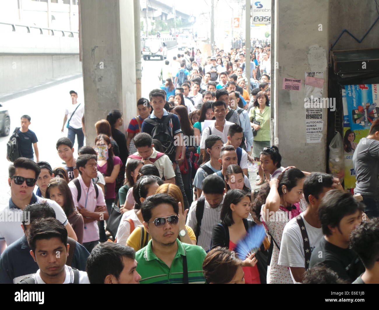 Quezon City, Philippines. 22 August, 2014. MRT passengers in North ...