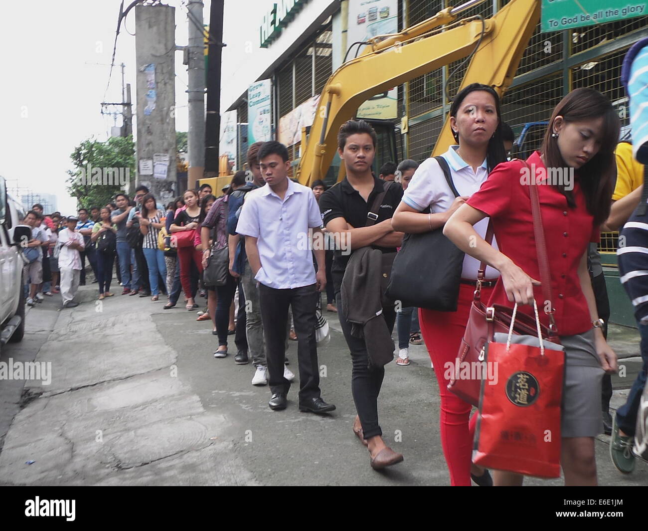 Quezon City, Philippines. 22 August, 2014. MRT passengers in North ...