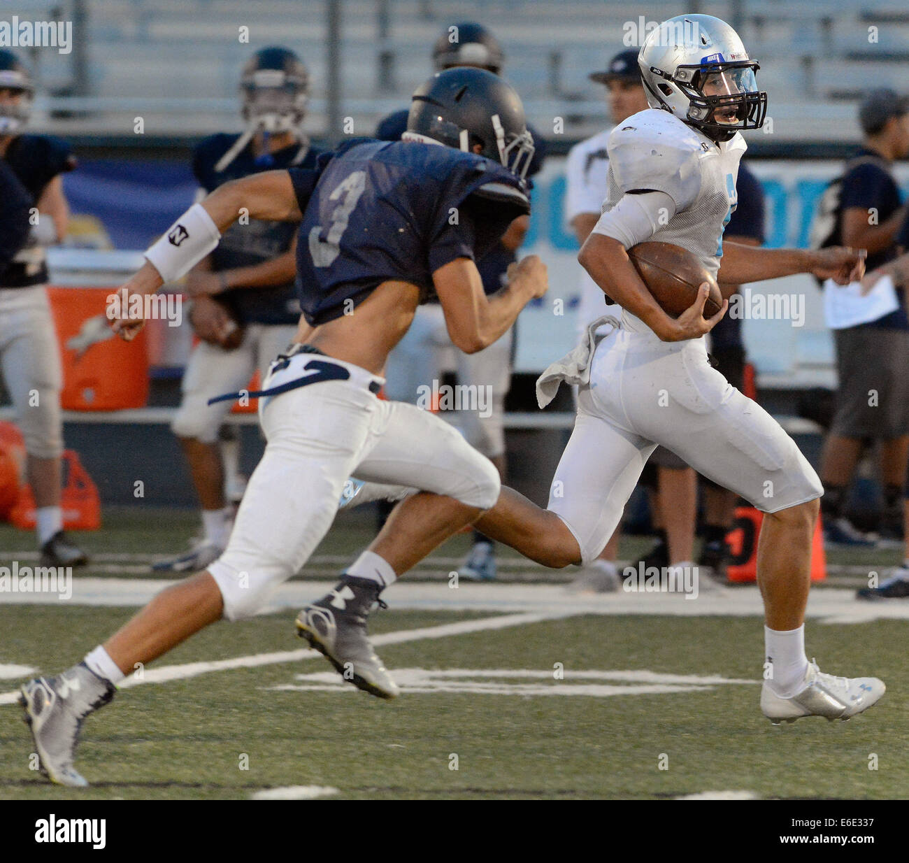 Rio Rancho, NM, USA. 21st Aug, 2014. Cleveland's quarterback Gabe ...