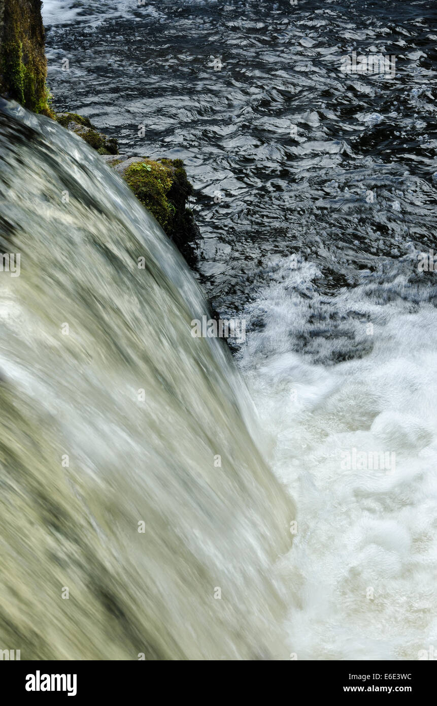 Near Abbey wall Tavistock the freshwater river Tavy weir and waterfalls ...