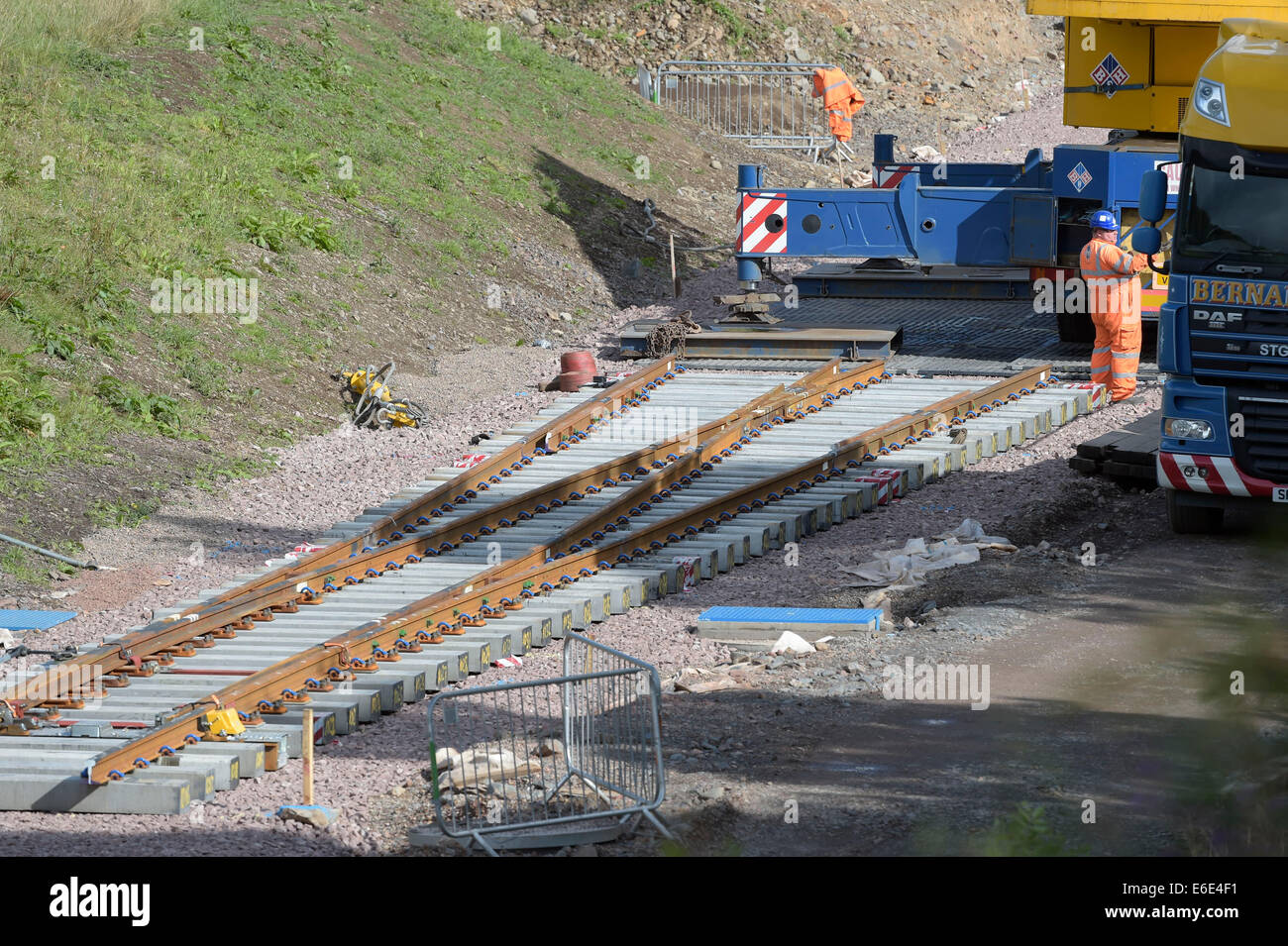 Galashiels, UK. 21 Aug 2014. Laying of test rail track at Tweedbank ...
