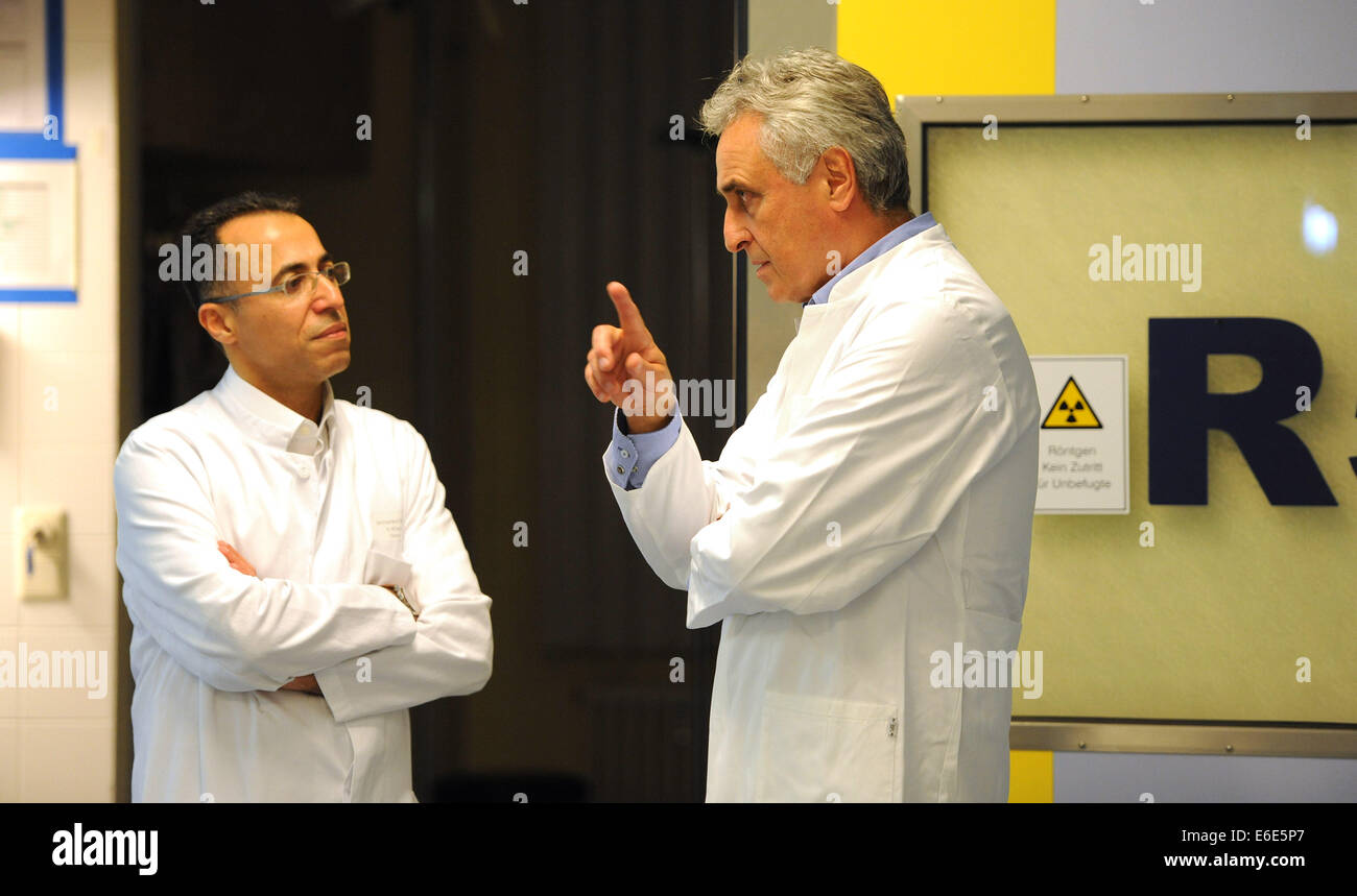 Westerstede, Germany. 22nd Aug, 2014. Palestinian surgeon Muneer Deeb ...