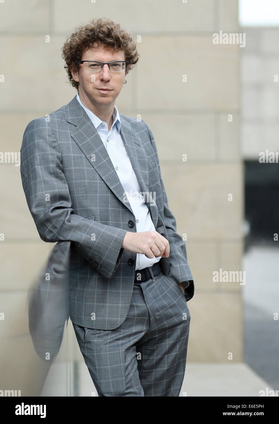 Cologne, Germany. 21st Aug, 2014. Dutch author Arnon Gruenberg poses in ...
