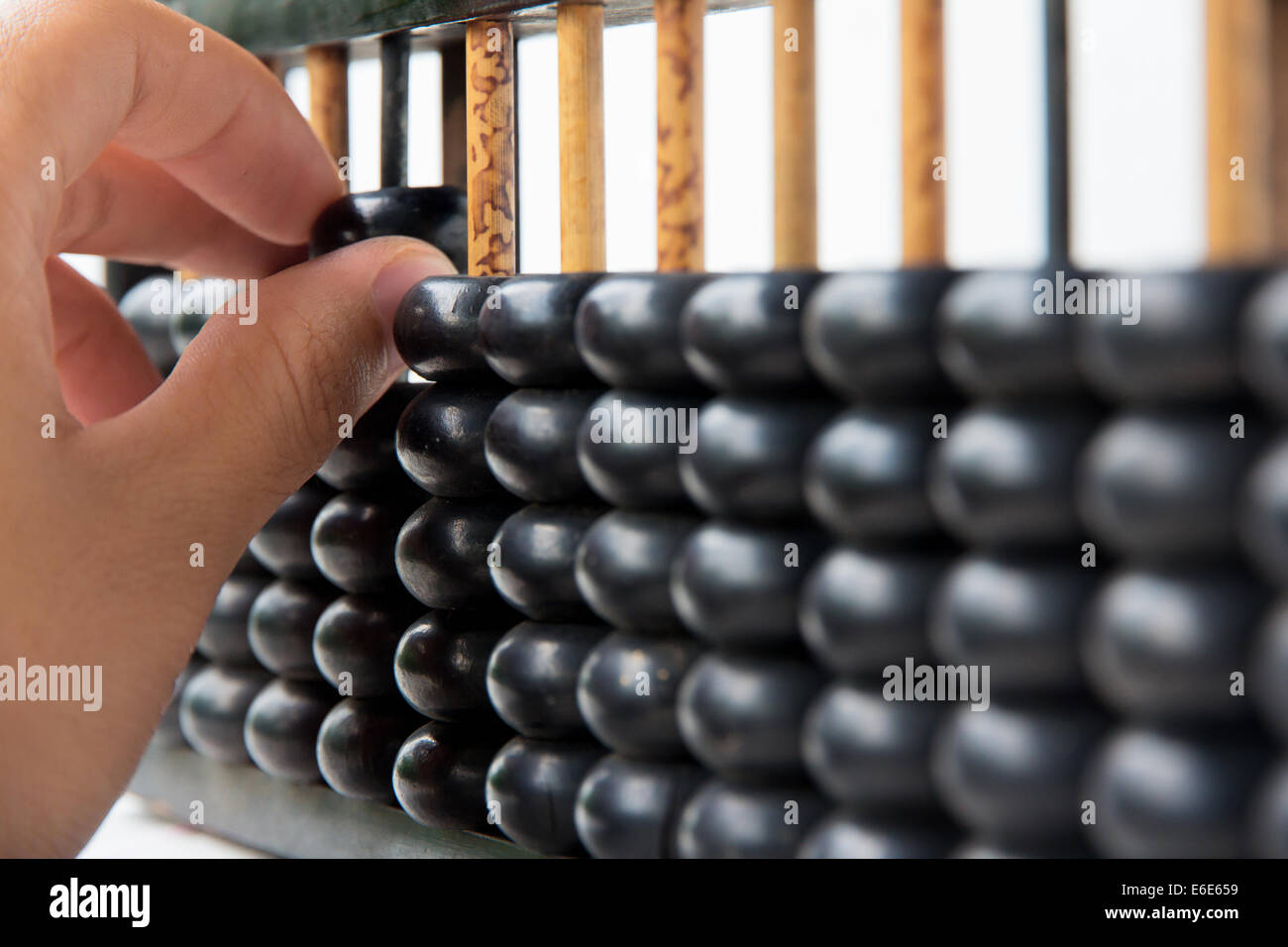 calculate on abacus Stock Photo - Alamy