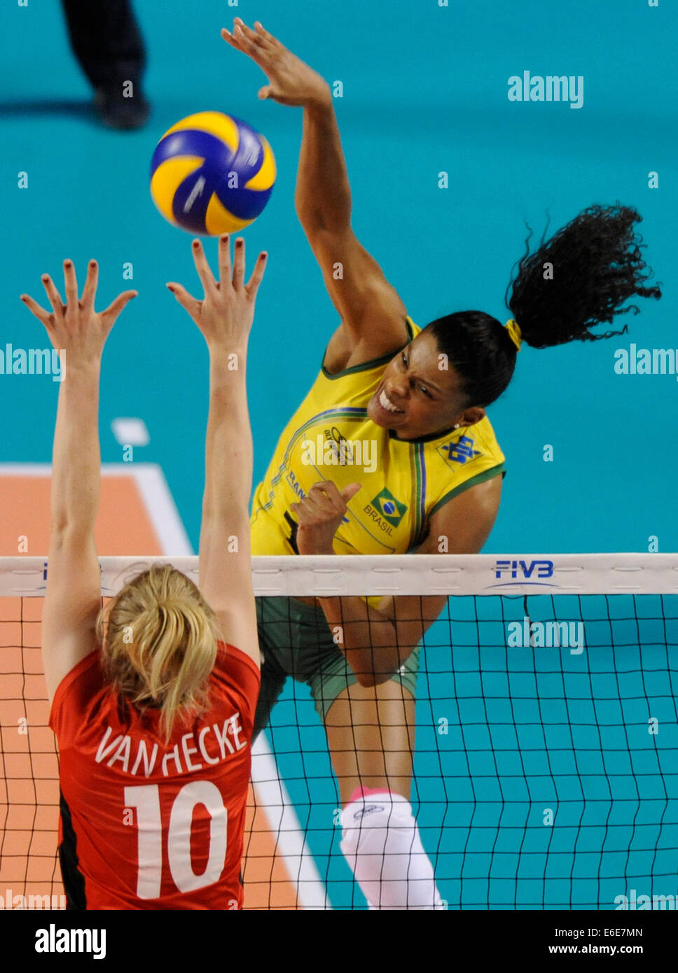 Tokyo, Japan. 22nd Aug, 2014. Fernanda Rodrigues (R) of Brazil spikes ...