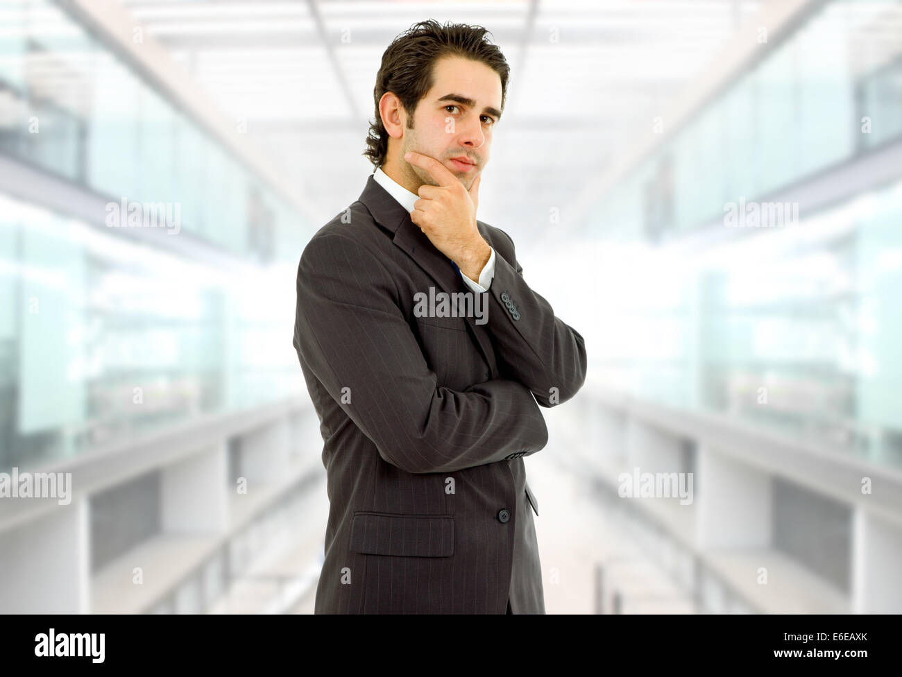 young business man thinking at the office Stock Photo - Alamy