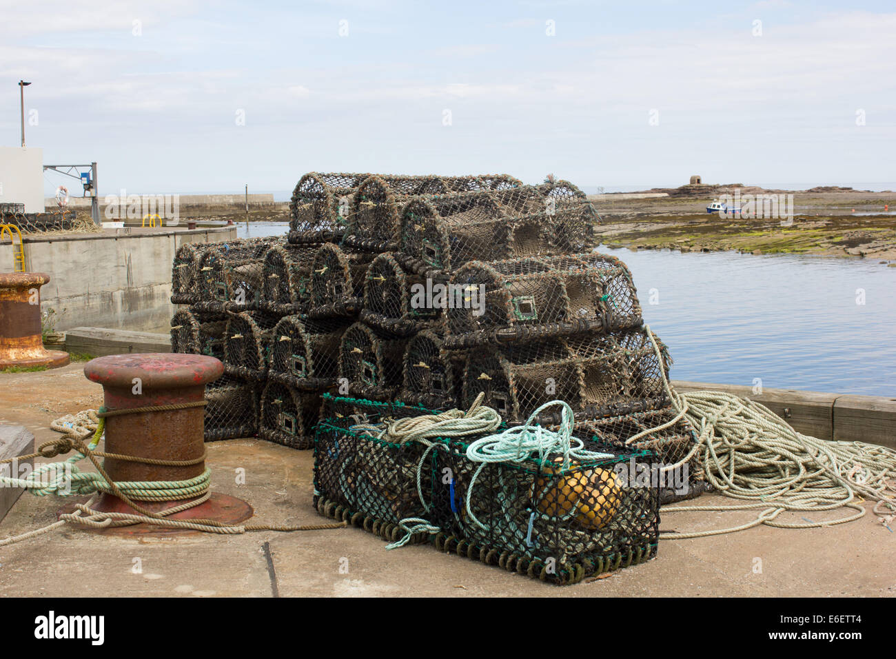 Lobster pots and rope on harbourside, Seahouses, Northumberland ...