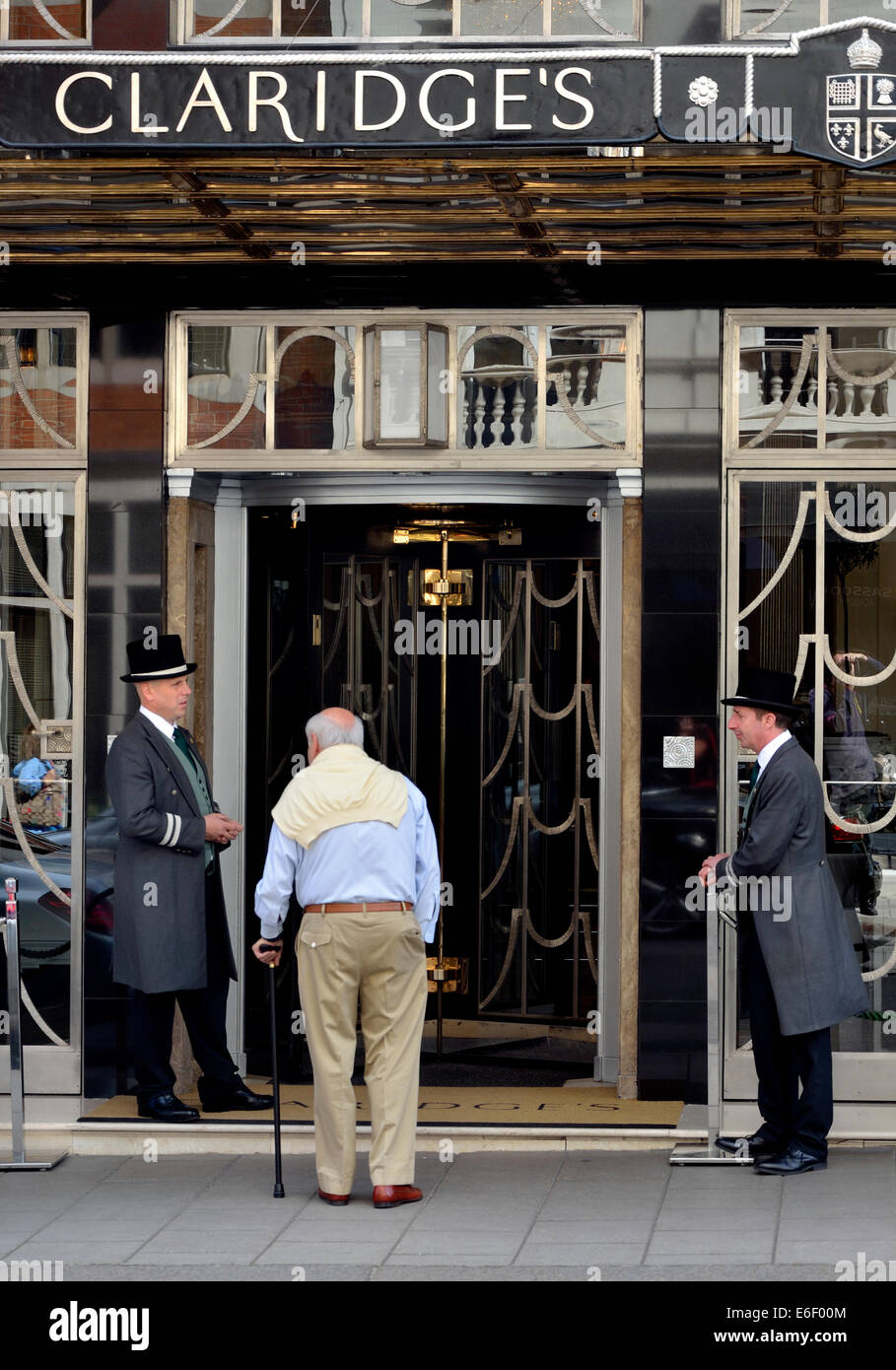 London, England, UK. Claridge's Hotel, Mayfair. Doormen at the main ...