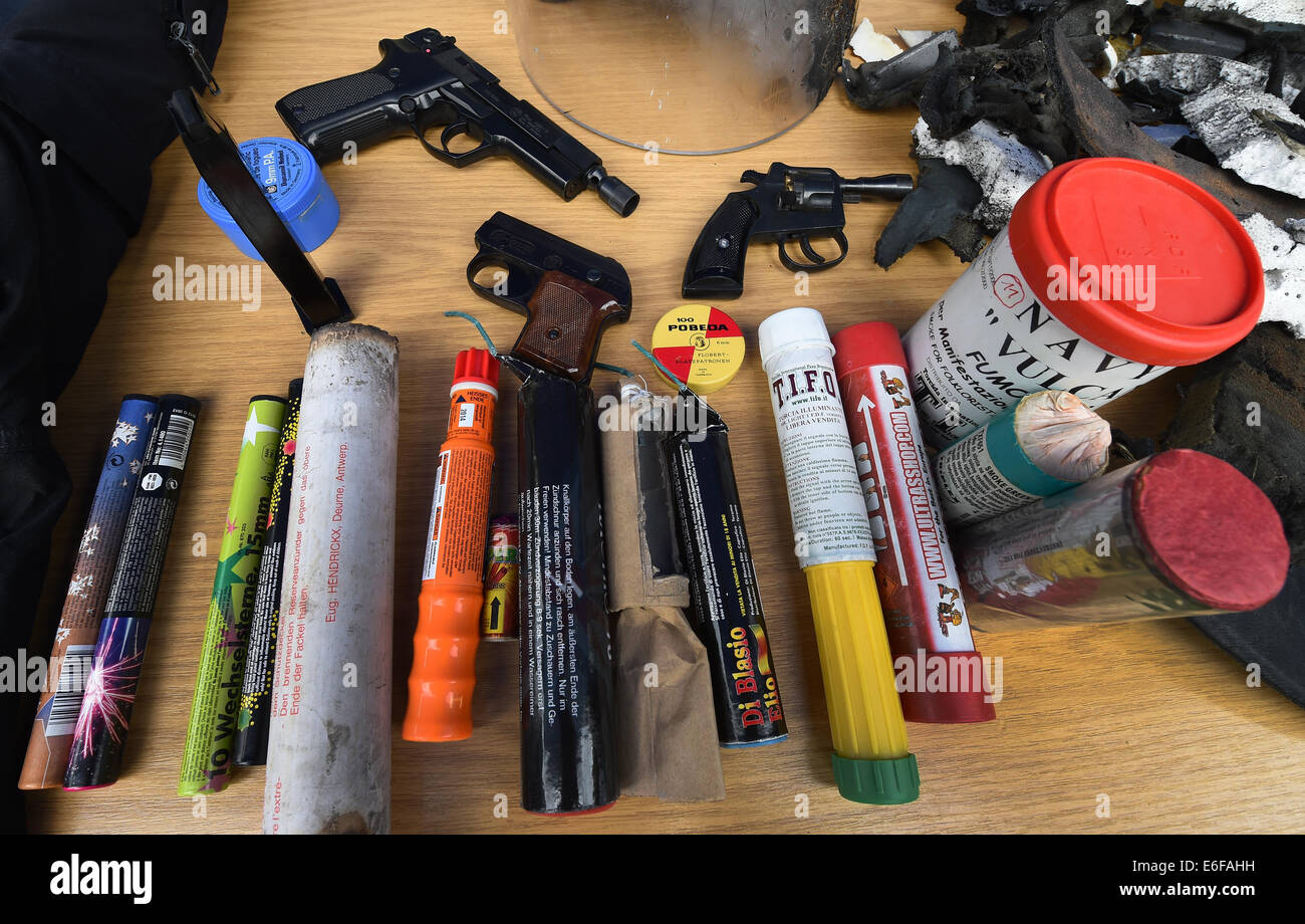 Hanover, Germany. 22nd Aug, 2014. Fire crackers, flares and weapons to ...