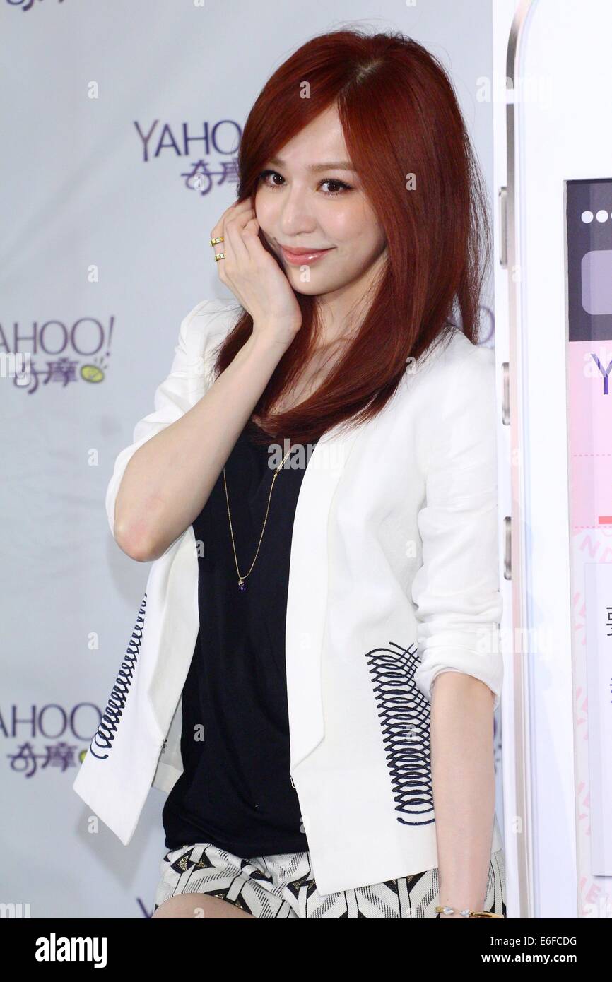 Taipei. 21st Aug, 2014. Singer Cindy Wang attends a commercial event held by Yahoo! in Taipei on ...