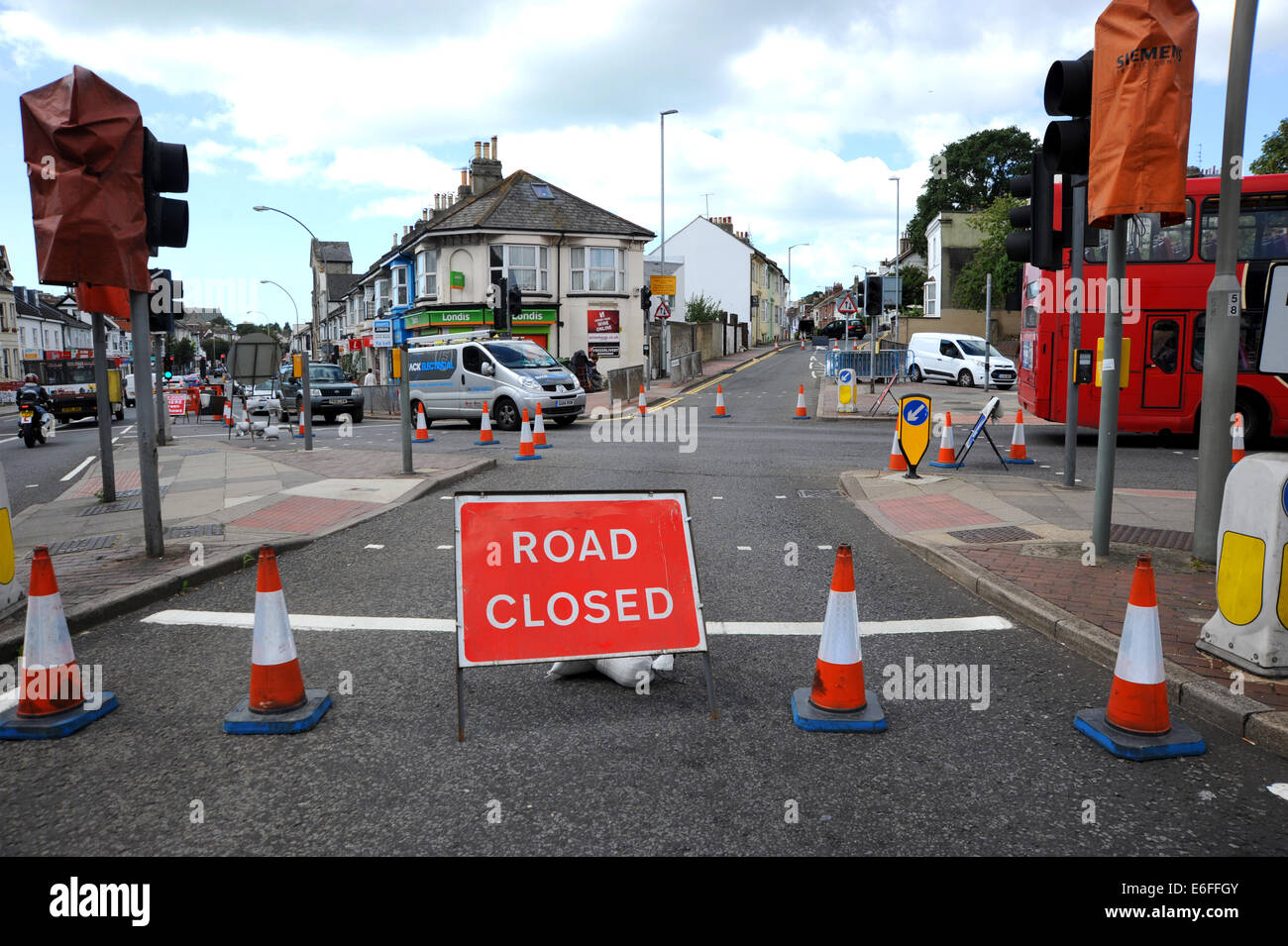 Brighton UK - Men at work roadworks road closed sign at Upper Lewes ...
