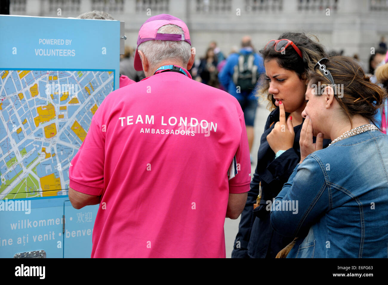 London, England, UK. Team London volunteer helping tourists in ...