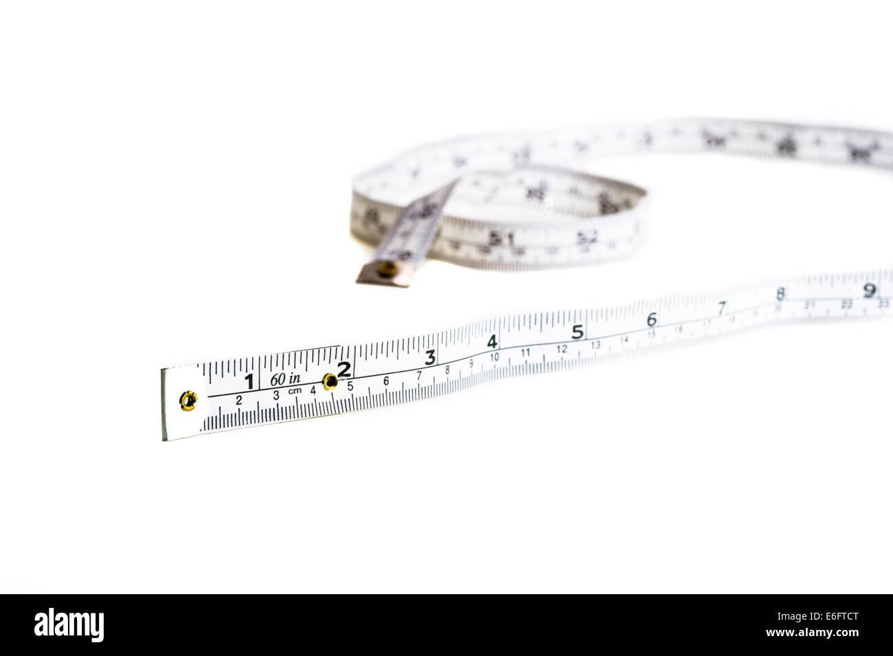 White dress makers tape measure, with selective focus Stock Photo - Alamy