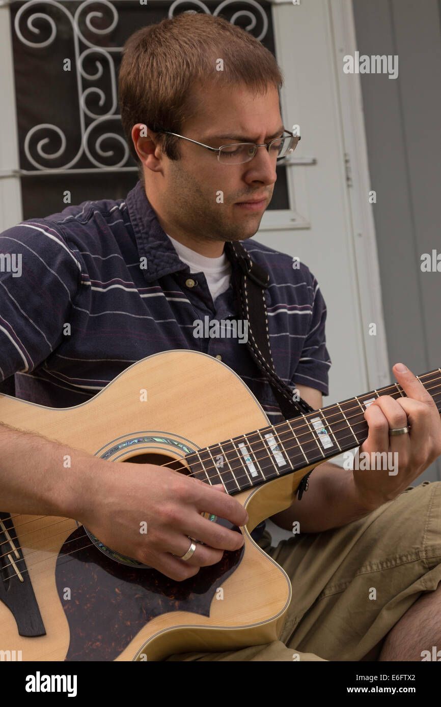 Male 20 guitar hi-res stock photography and images - Alamy