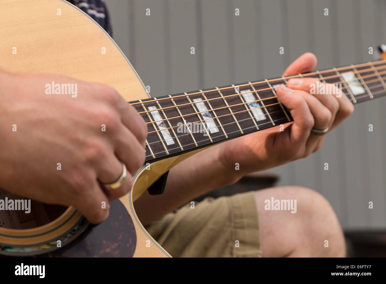 Man playing instrument hi-res stock photography and images - Alamy