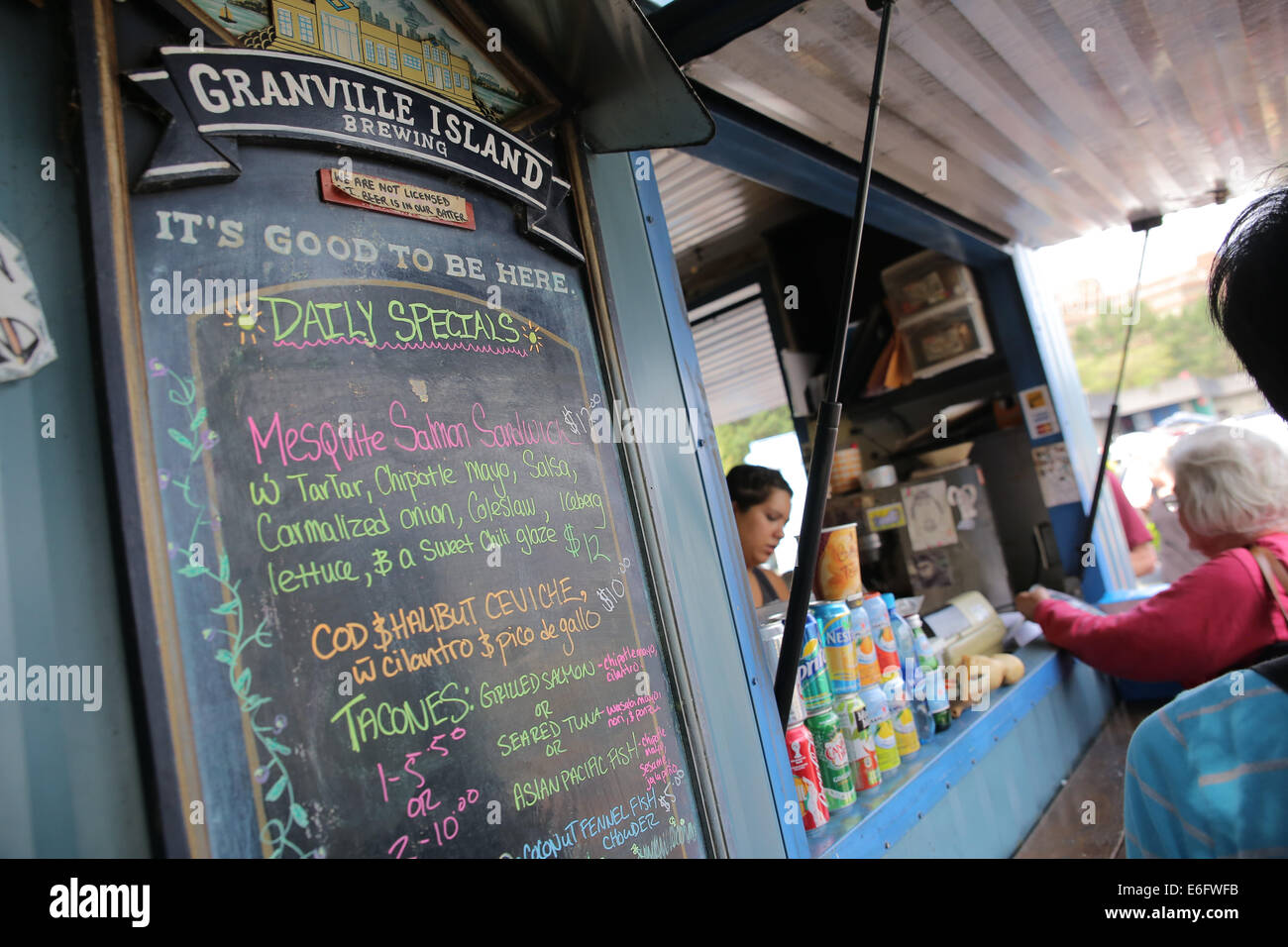 Granville island fish and chip vendor Stock Photo - Alamy