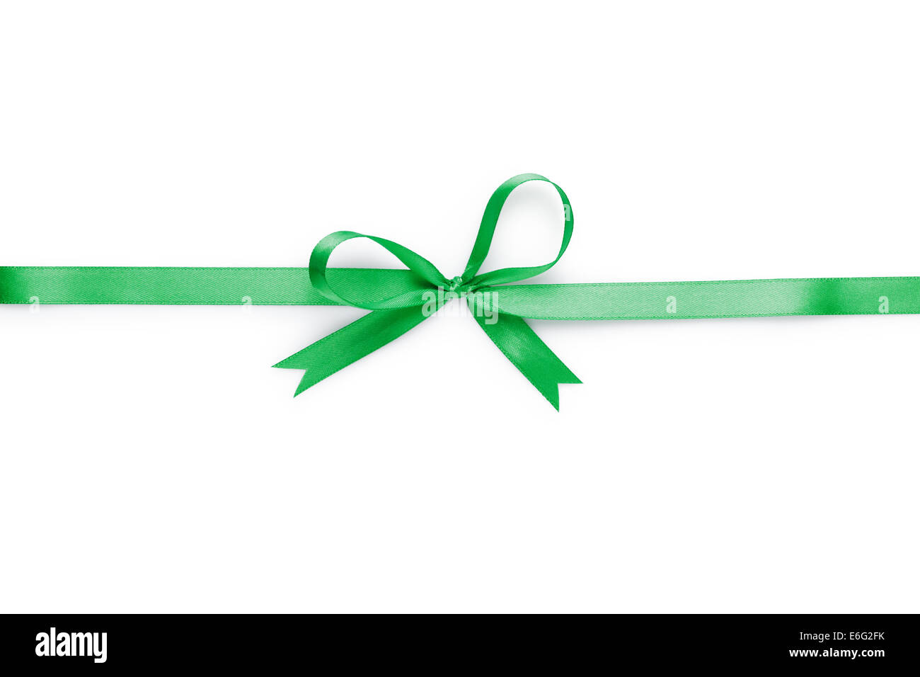 green thin ribbon with bow, isolated on white Stock Photo - Alamy
