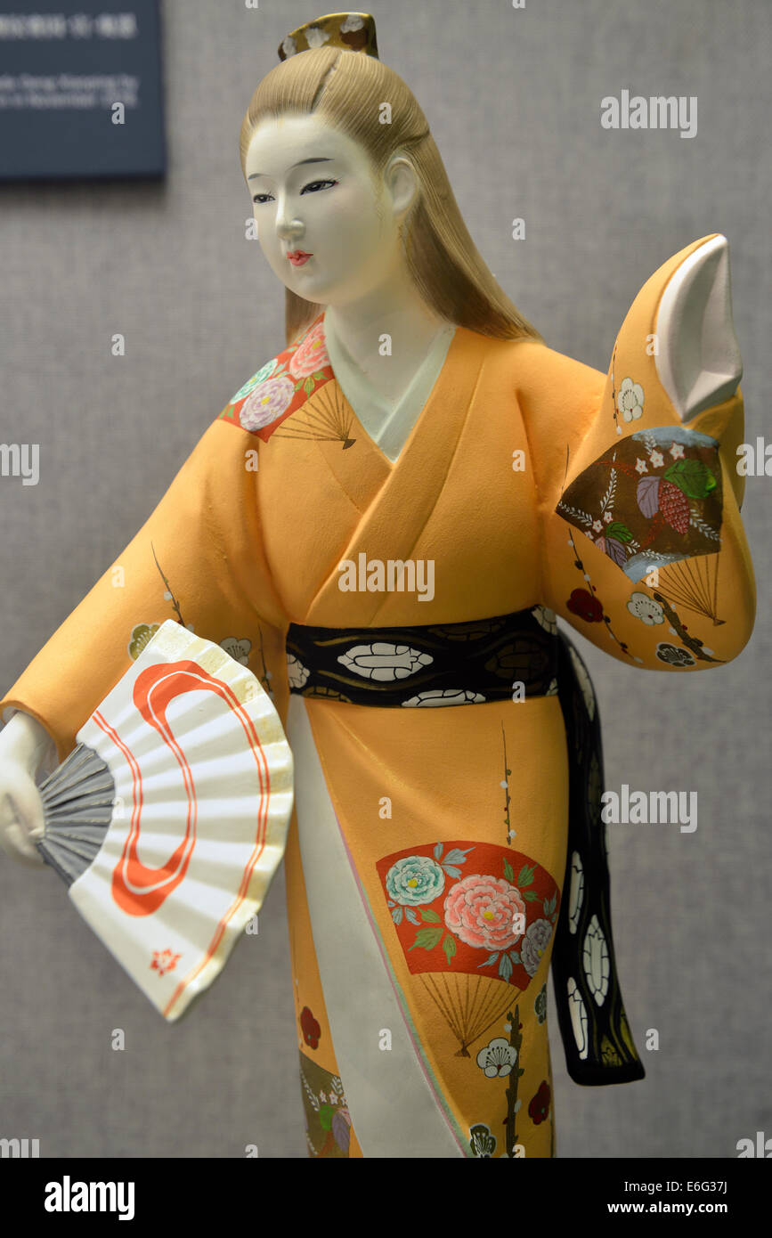 Hakata doll holding a fan Stock Photo - Alamy