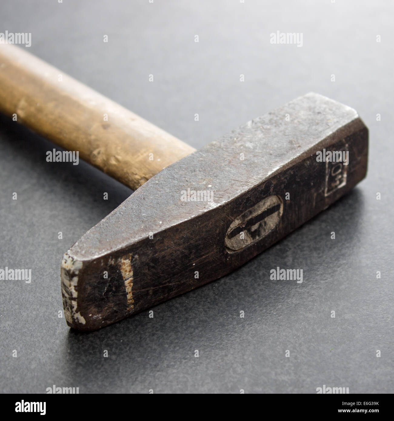 Old used hammer on table, close up Stock Photo - Alamy
