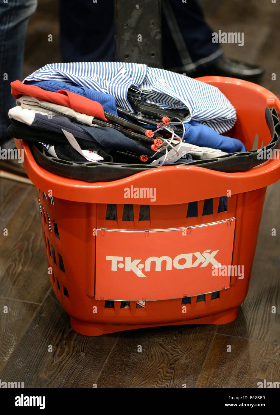 Berlin, Germany. 20th Aug, 2014. A shopping basket full of clothing in ...
