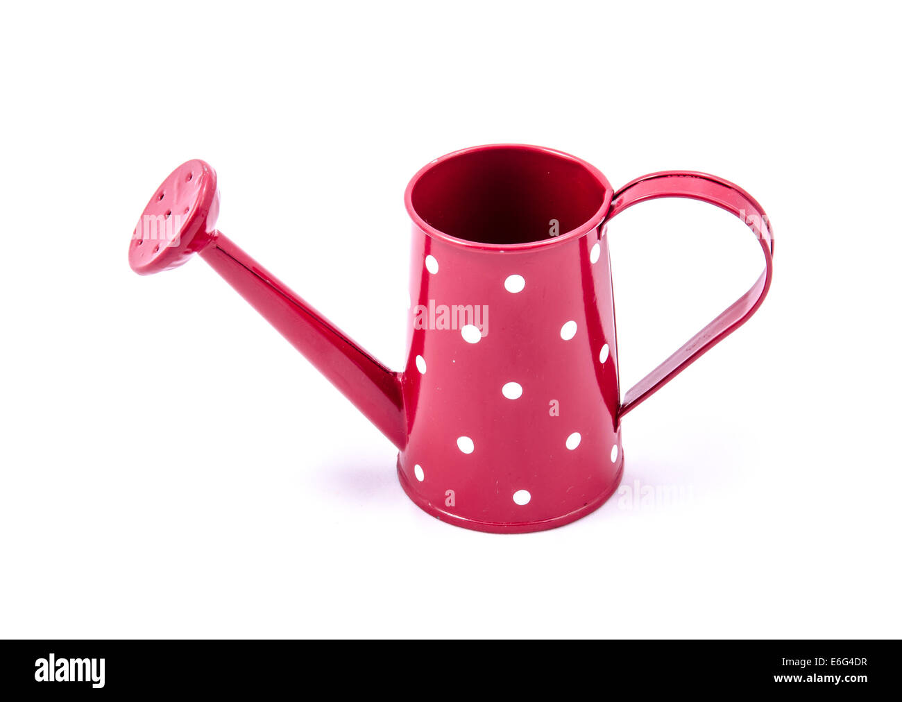 red watering pot on white background Stock Photo - Alamy