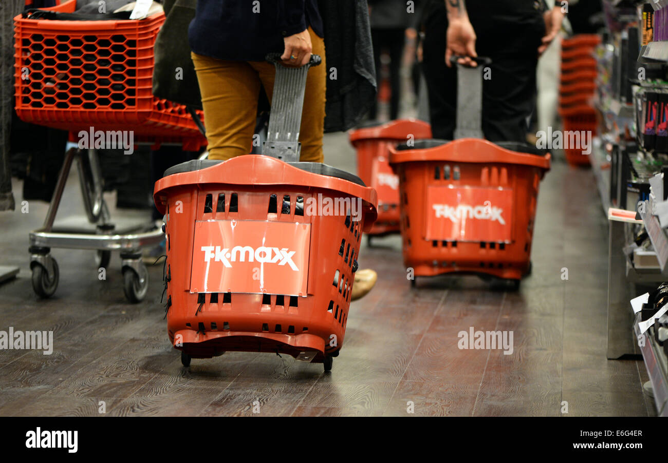 Berlin, Germany. 20th Aug, 2014. Customers pull shopping baskets in the ...