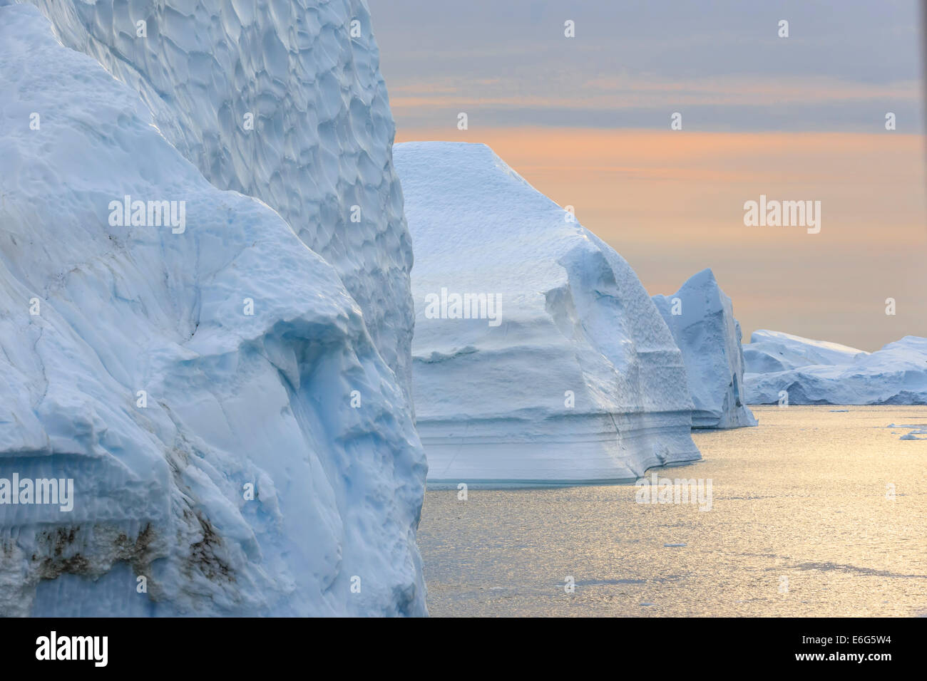 Icebergs late in the Arctic Day Stock Photo - Alamy