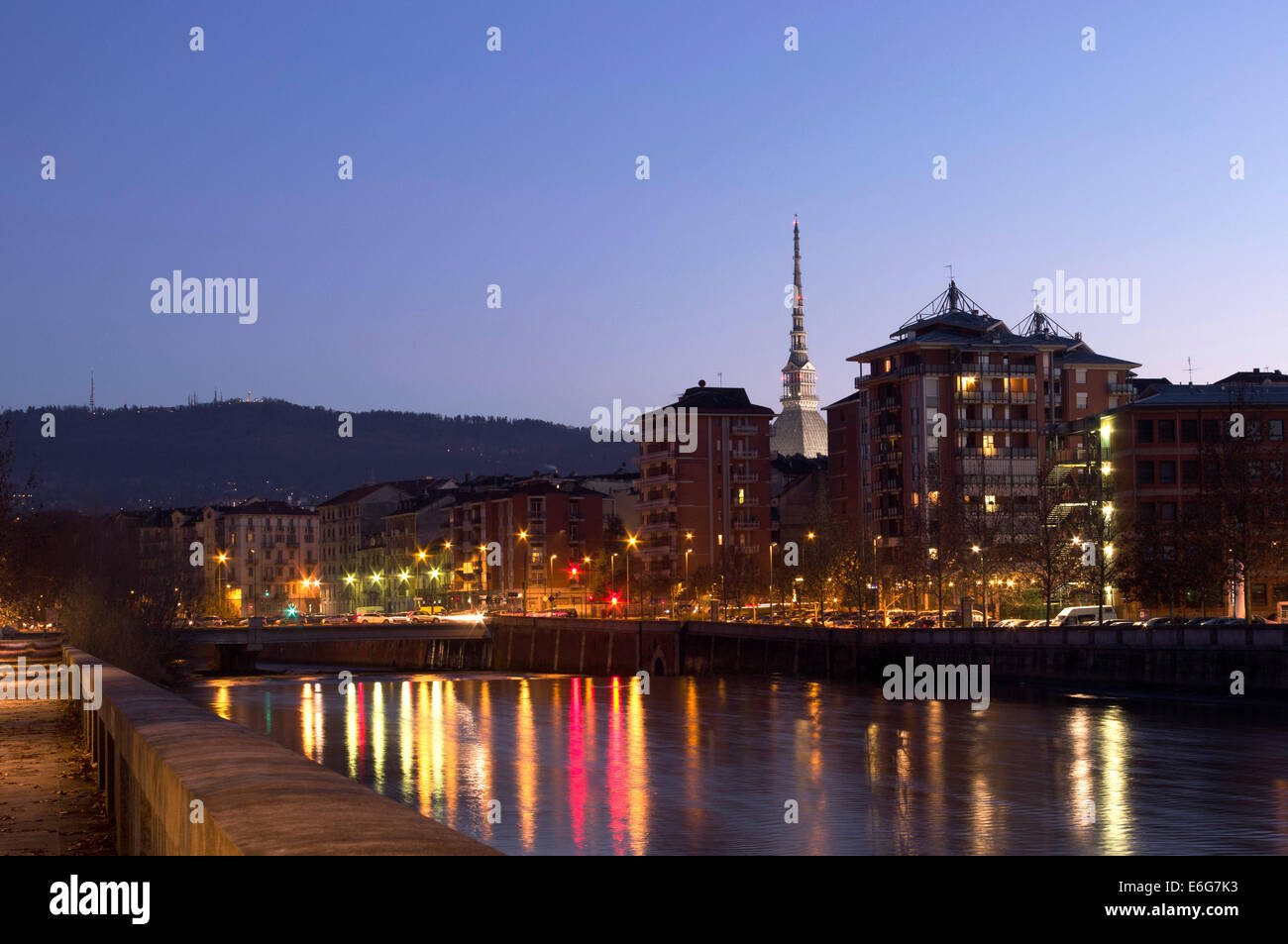 Dora Riparia river in Turin at dusk with Mole Antonelliana in the ...