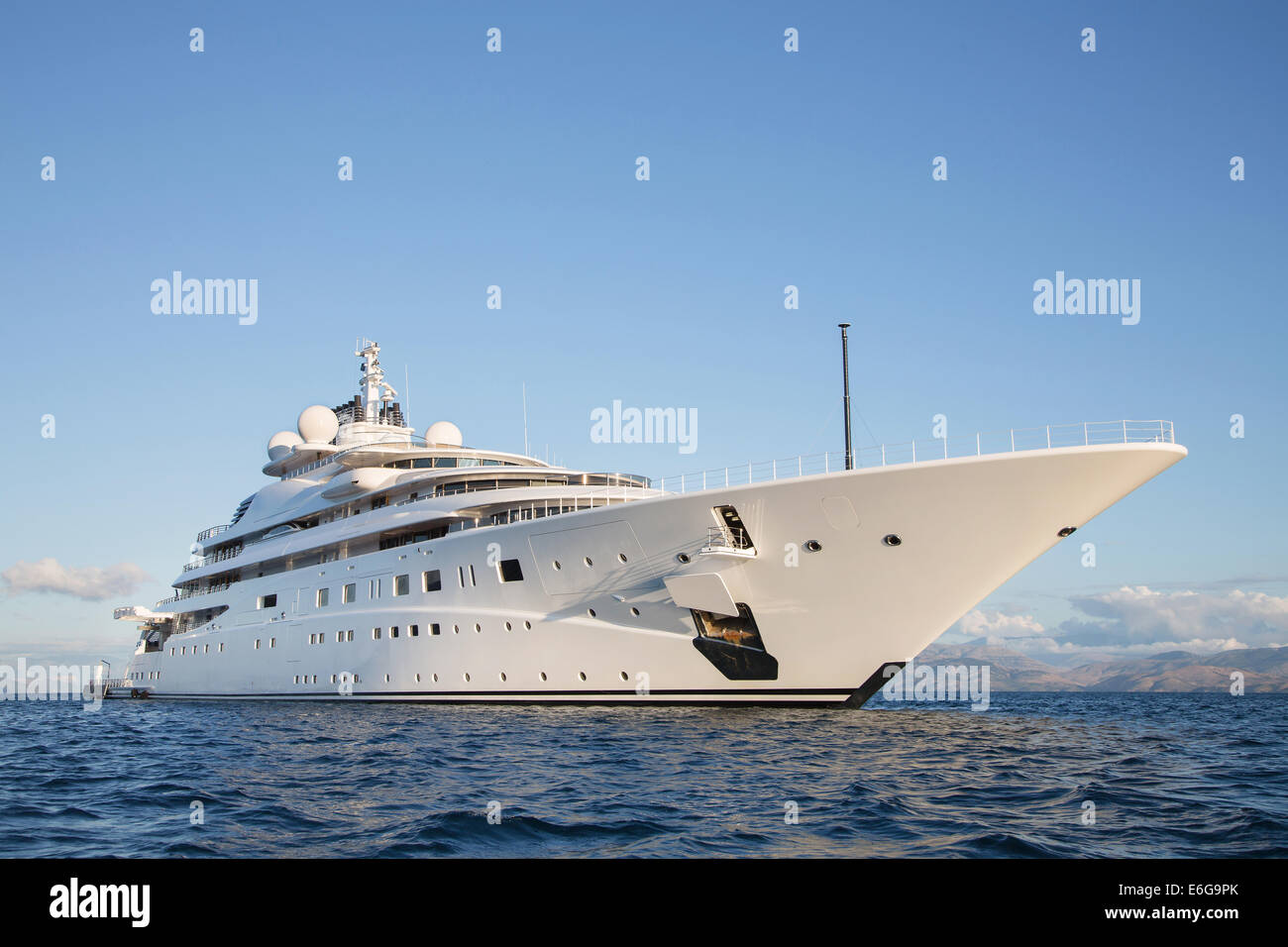 Gigantic big and large luxury mega or super motor yacht on the blue ...