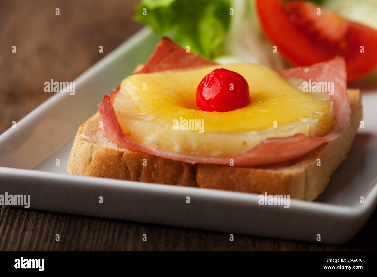 toast hawaii with a cherry Stock Photo - Alamy