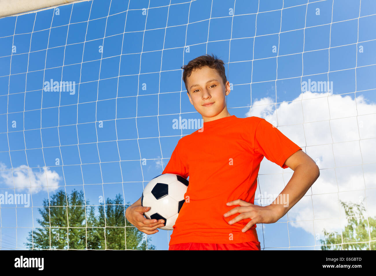 Blond boy playing football soccer hi-res stock photography and images ...