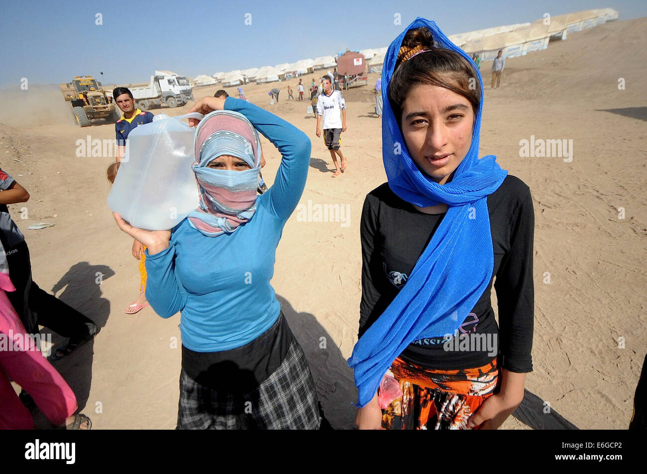 Zakho, Iraq. 22nd Aug, 2014. Yazidi refugees fleeing IS militants at a ...