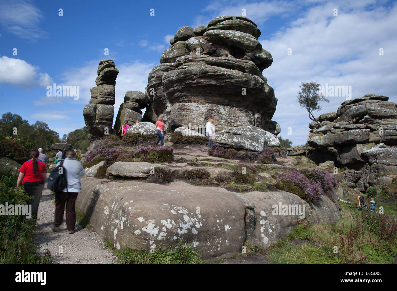 People at Brimham Rocks; Brimham Crags a collection of balancing ...