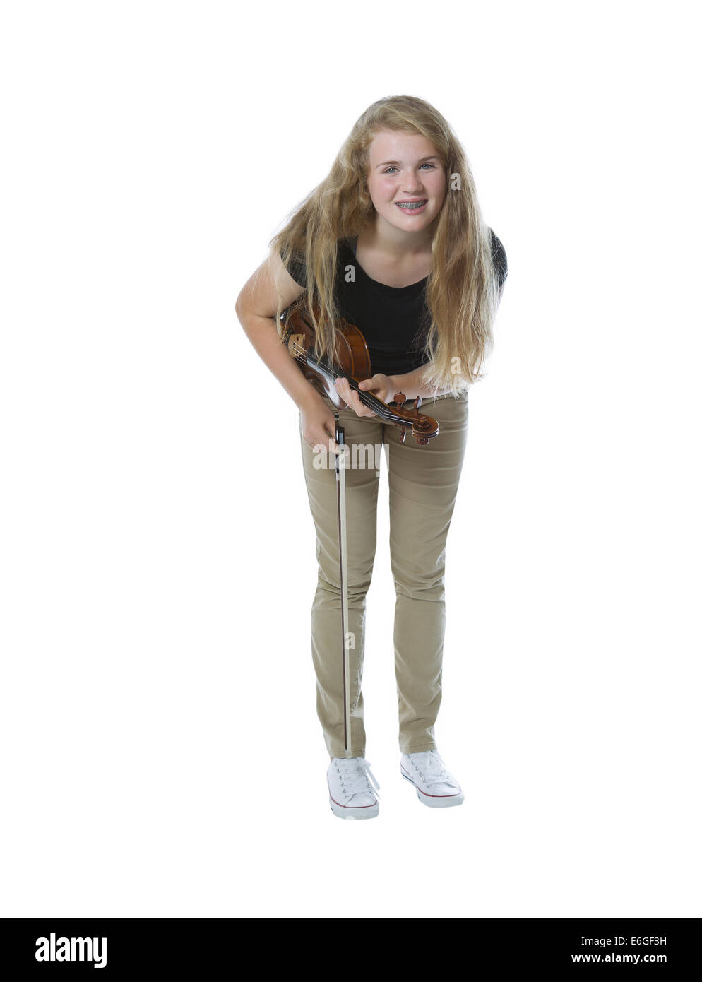 Full body front view, looking forward, of pretty young teenage girl ...