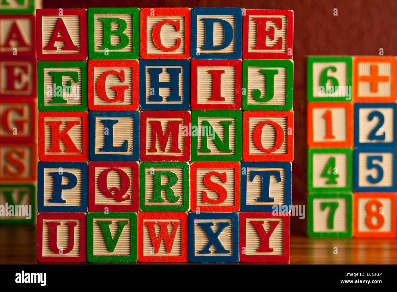 Alphabet Blocks stacked together with numbered blocks Stock Photo - Alamy